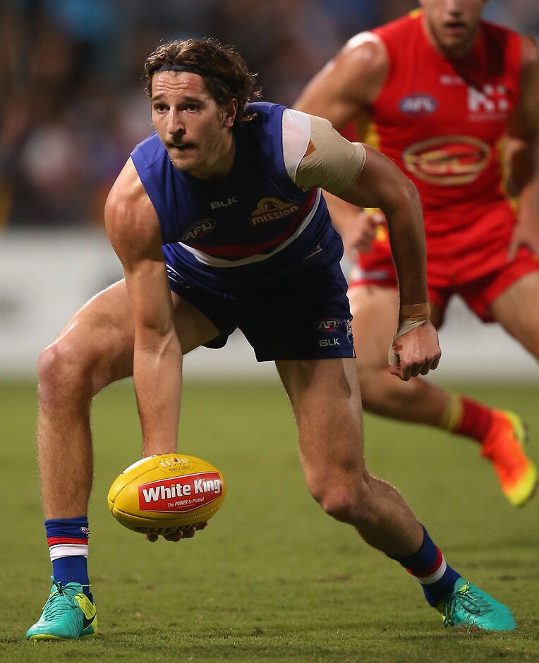 Match report: Dogs despatch Suns with ease to move into top four - AFL ...