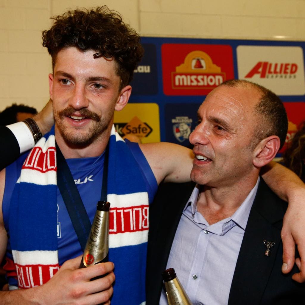 Heart-and-soul Bulldog mid off the table after re-signing